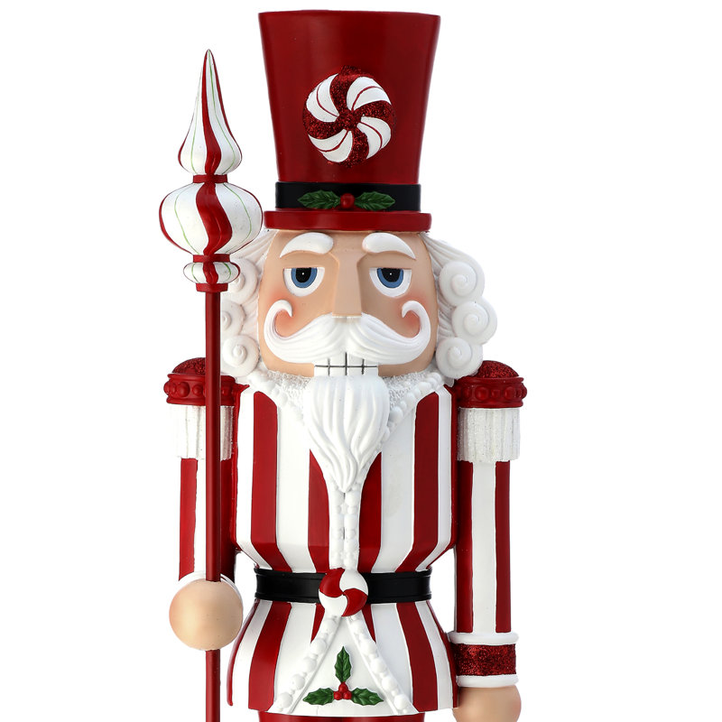 The Holiday Aisle® 24" Resin Peppermint Nutcracker | Wayfair